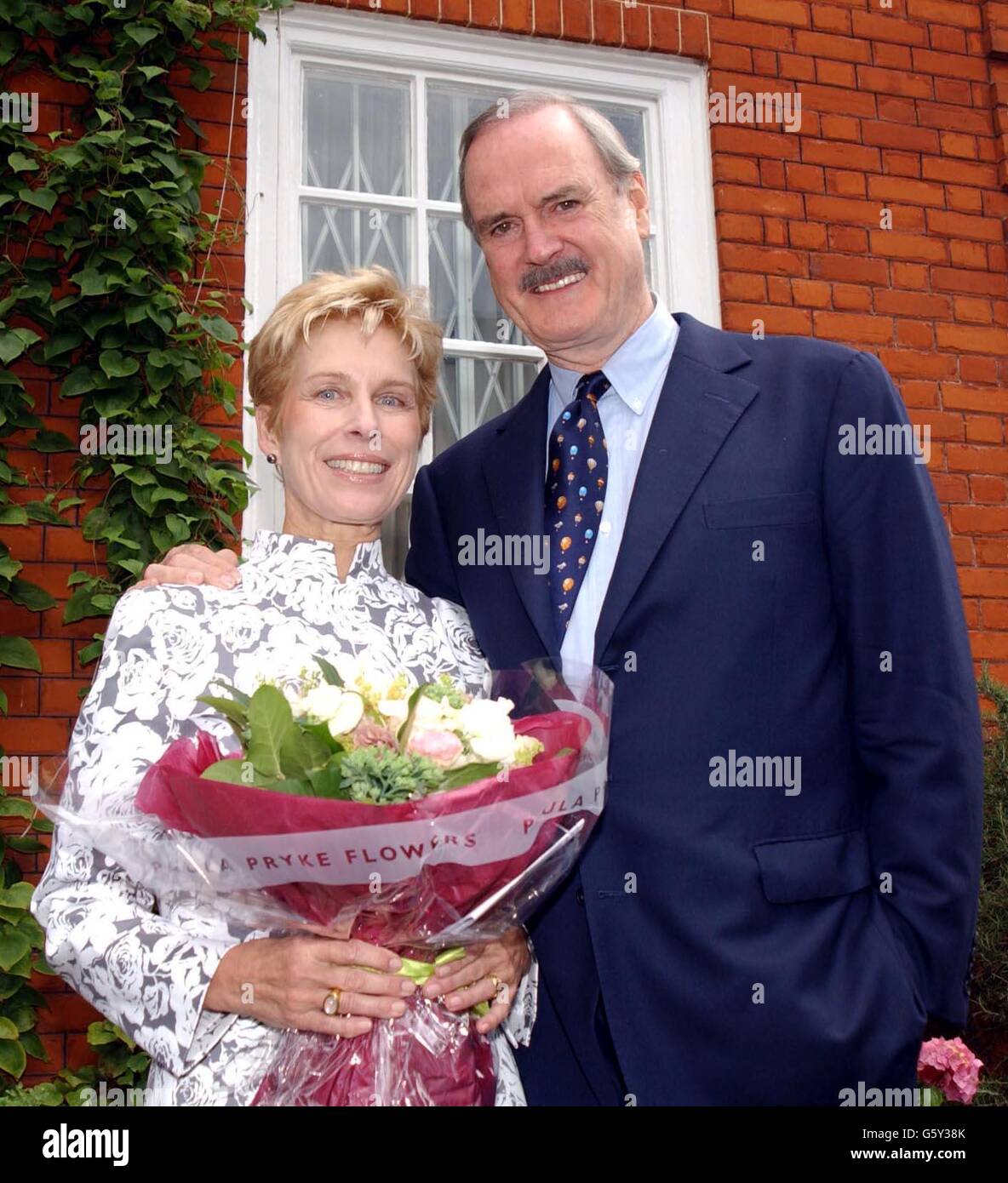 Comedian and actor John Cleese with his wife Alyce Faye after unveiling ...