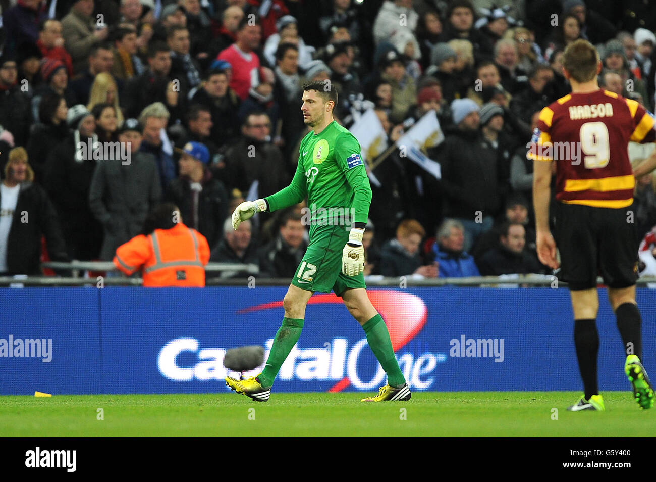 Bradford City goalkeeper Matthew Duke walks off after being shown a red ...