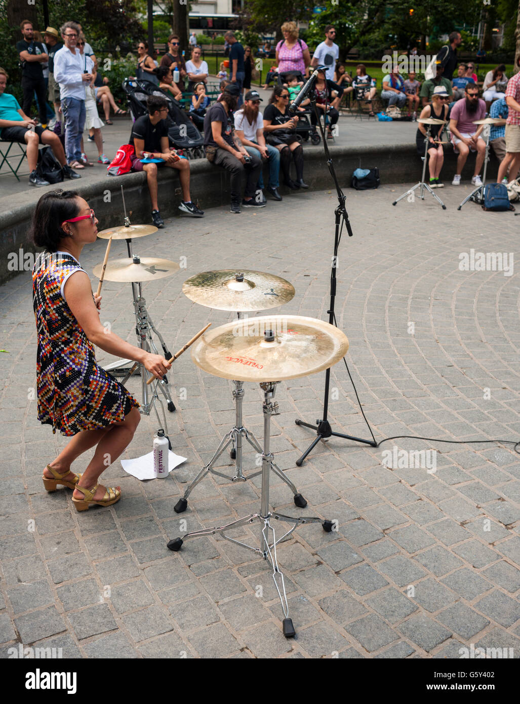Drummer Emi Kariya performs a solo on cymbals in "Shimmer" by Brian ...