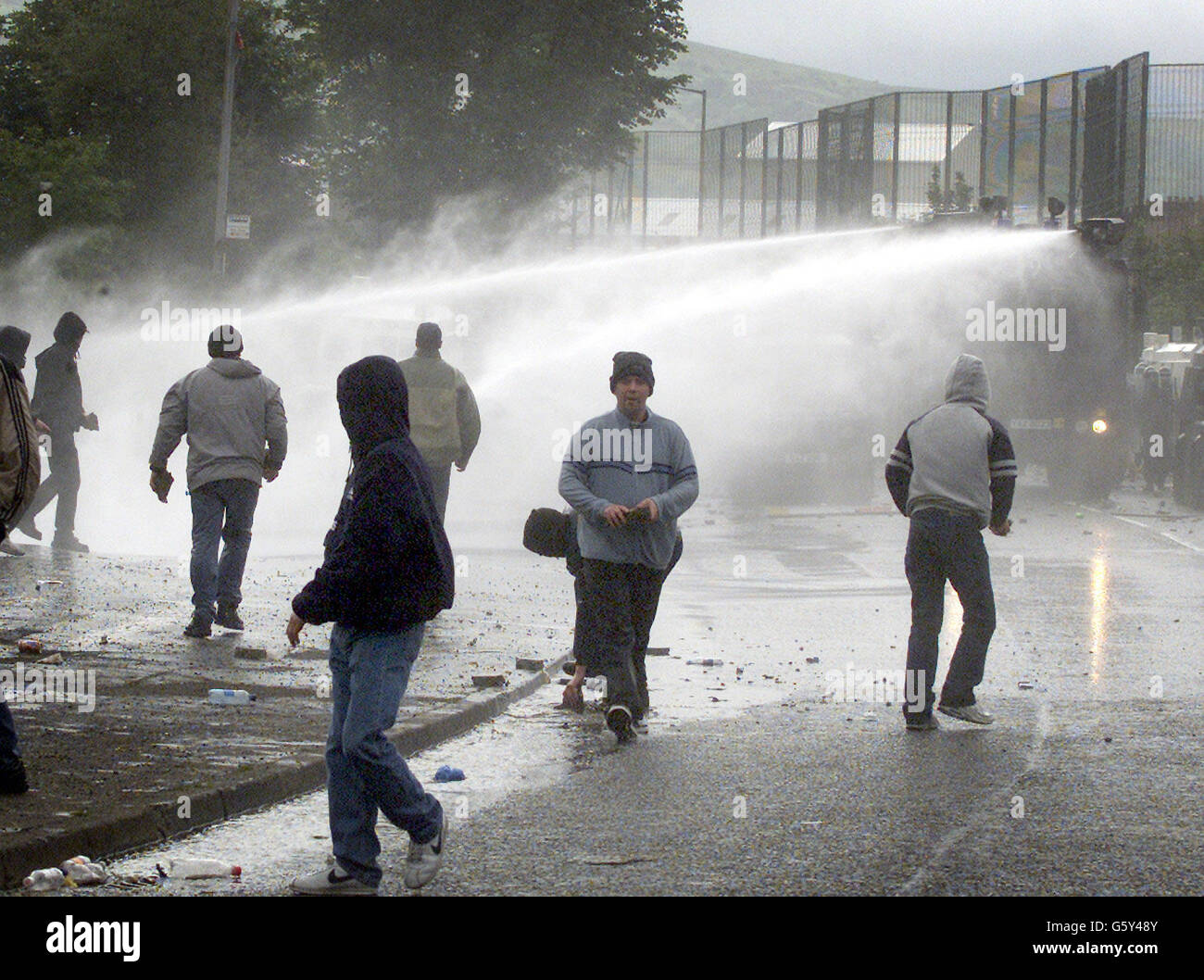 Nationalists water cannon crowds police riots hi-res stock photography ...