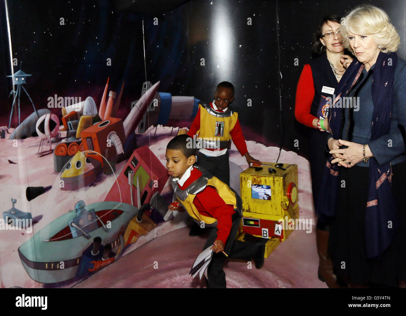The Duchess of Cornwall (right) watches children from Carpenters ...