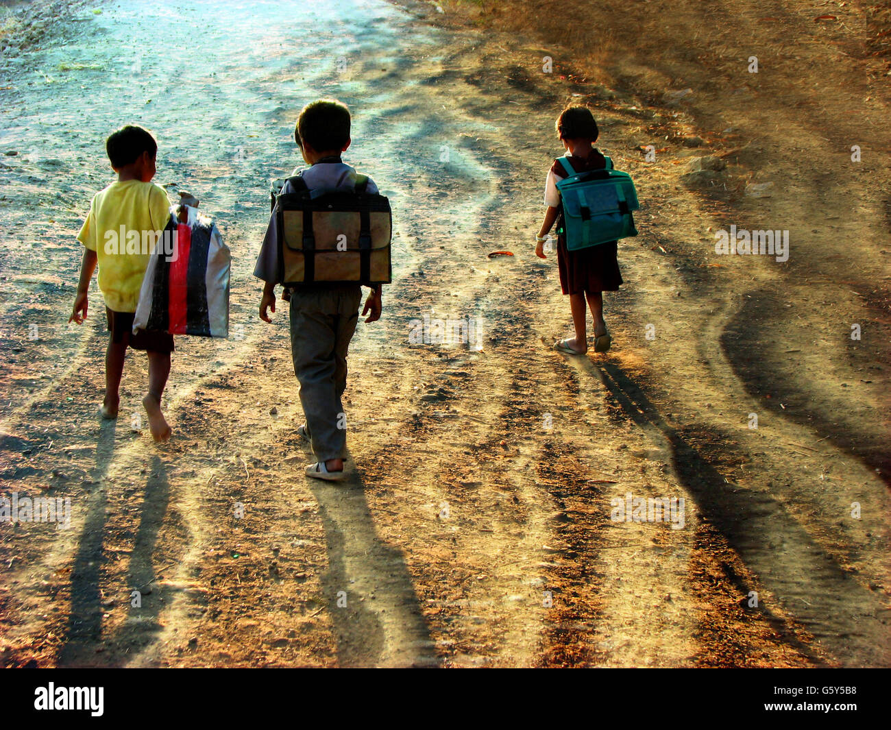 Indian school children going back home from school Stock Photo - Alamy