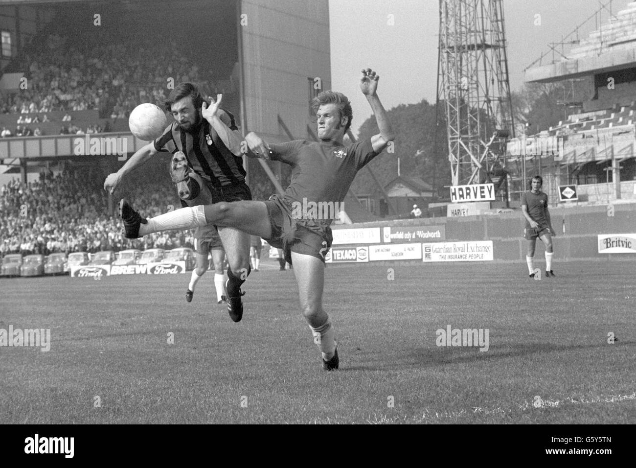 Coventry City forward Alan Green (in stripes) challenges Chelsea full ...