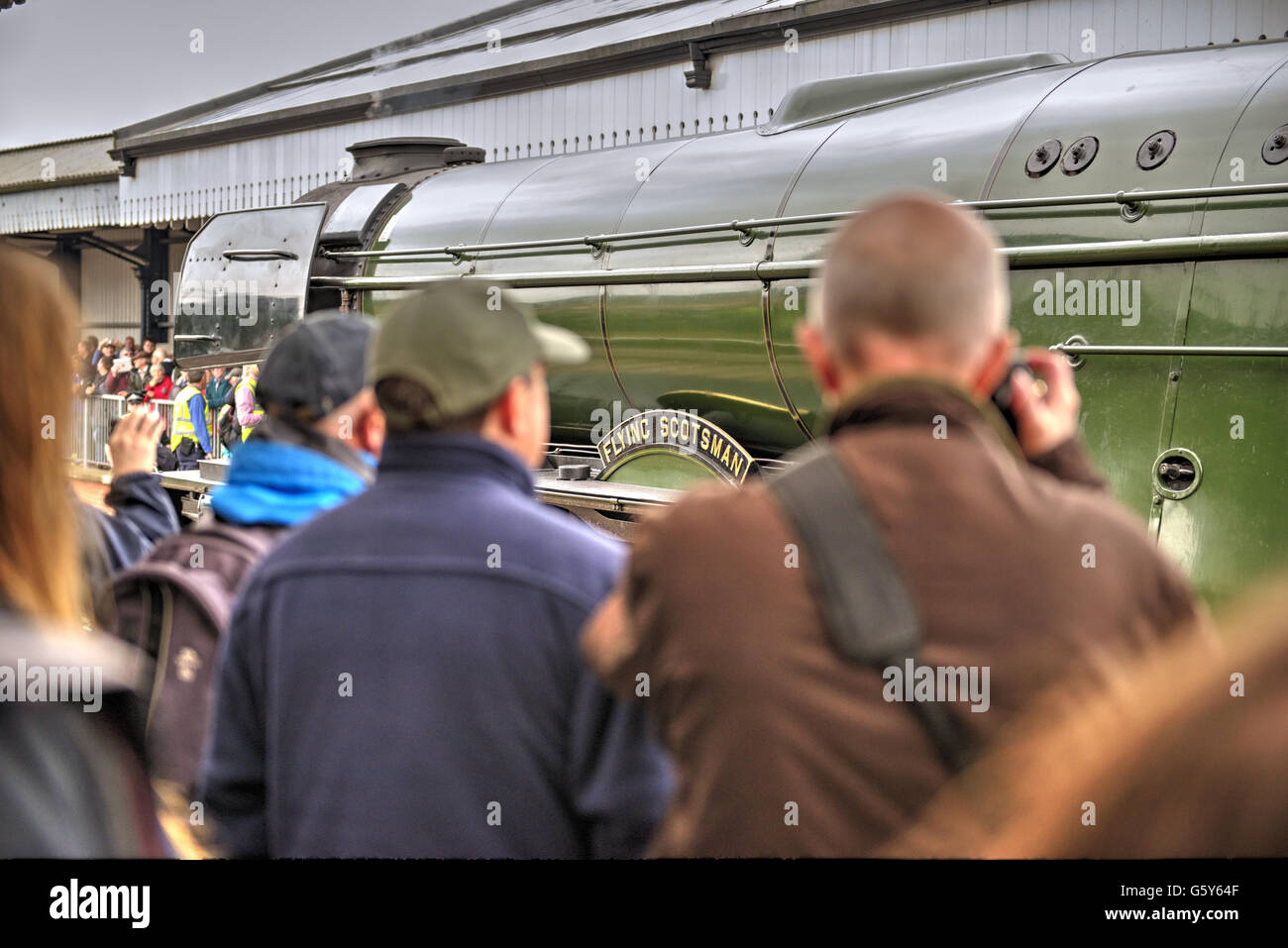 Crowd watching steam locomotive hi-res stock photography and images - Alamy