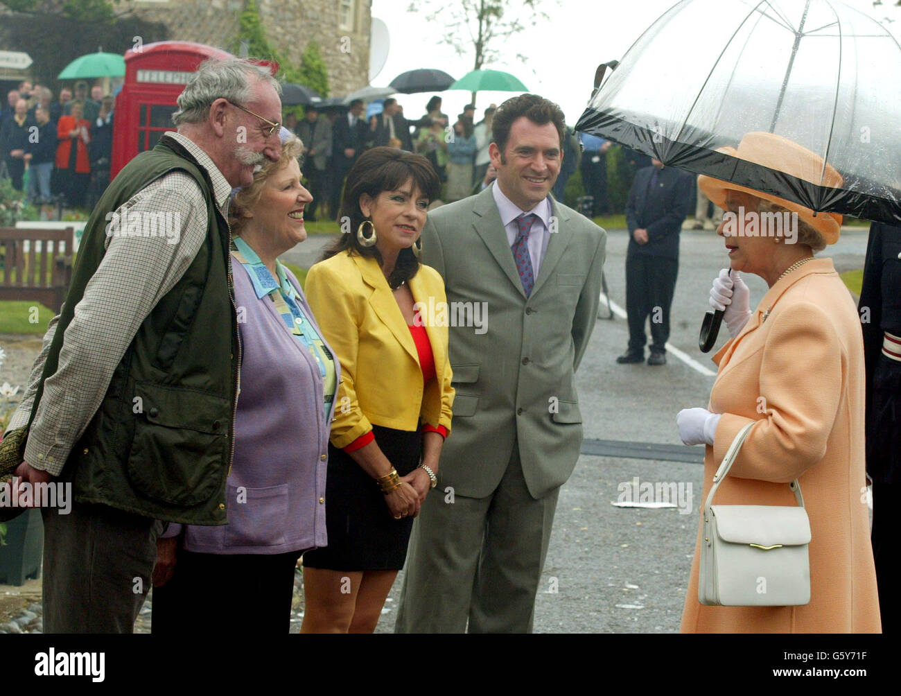 Britain's Queen Elizabeth II chats to actors (l-r) Stan Richards (Seth ...