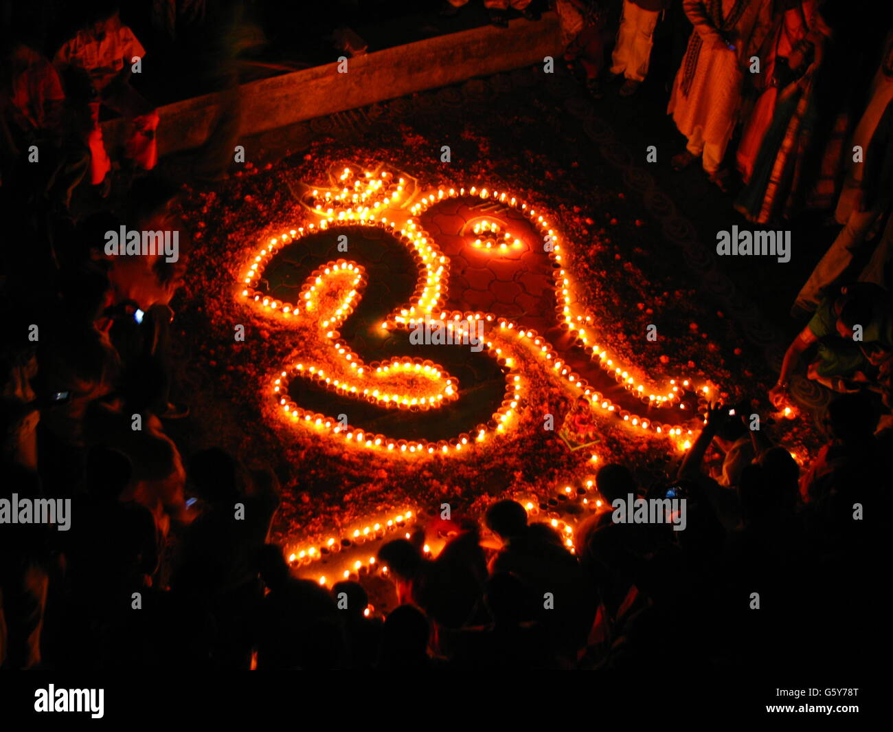 Aum design made with Lamps during diwali festival in India Stock Photo ...