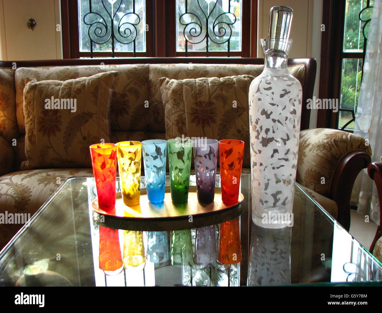 A set of colorful glasses and Bottle Stock Photo - Alamy