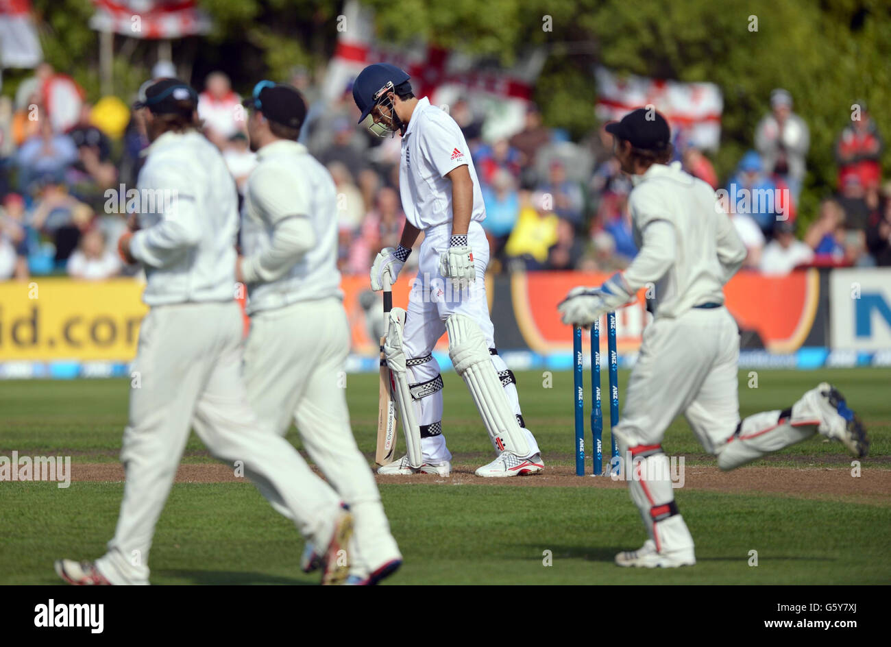 England captain Alastair Cook leaves the field after being caught by ...