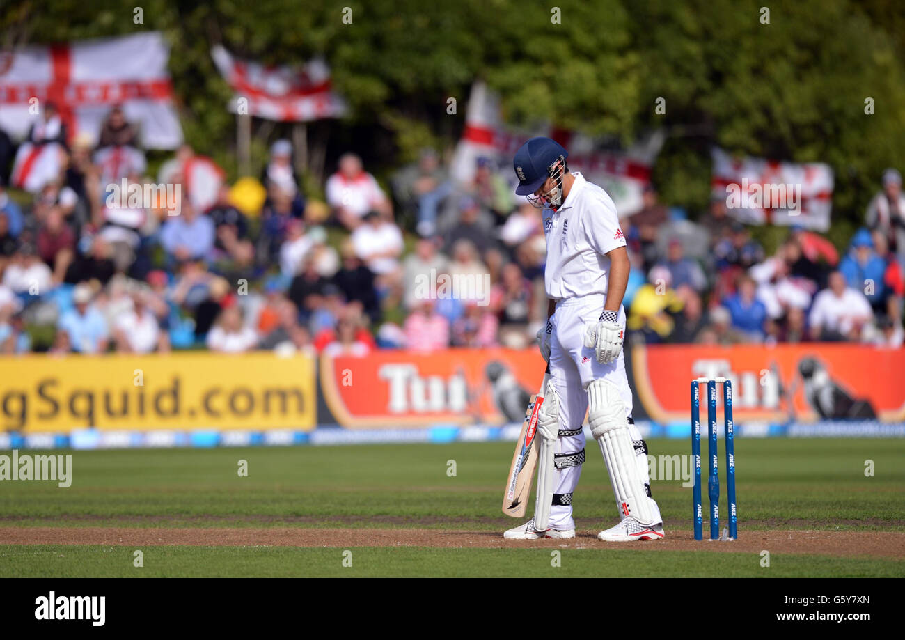 England captain Alastair Cook reacts after being caught by New Zealand ...