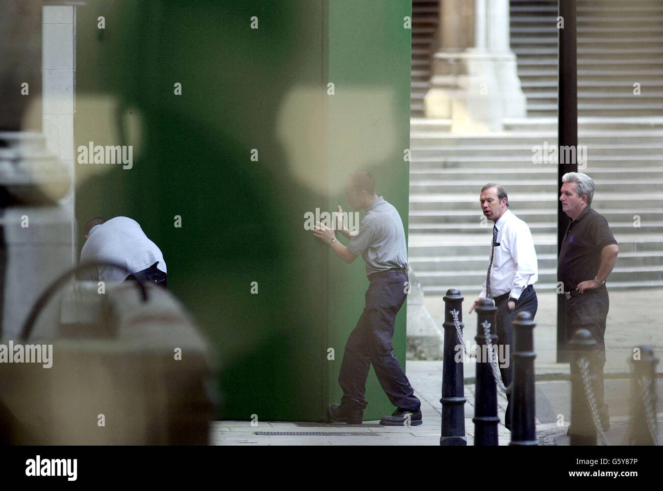 Security staff at the Royal Courts of Justice in central London get ...