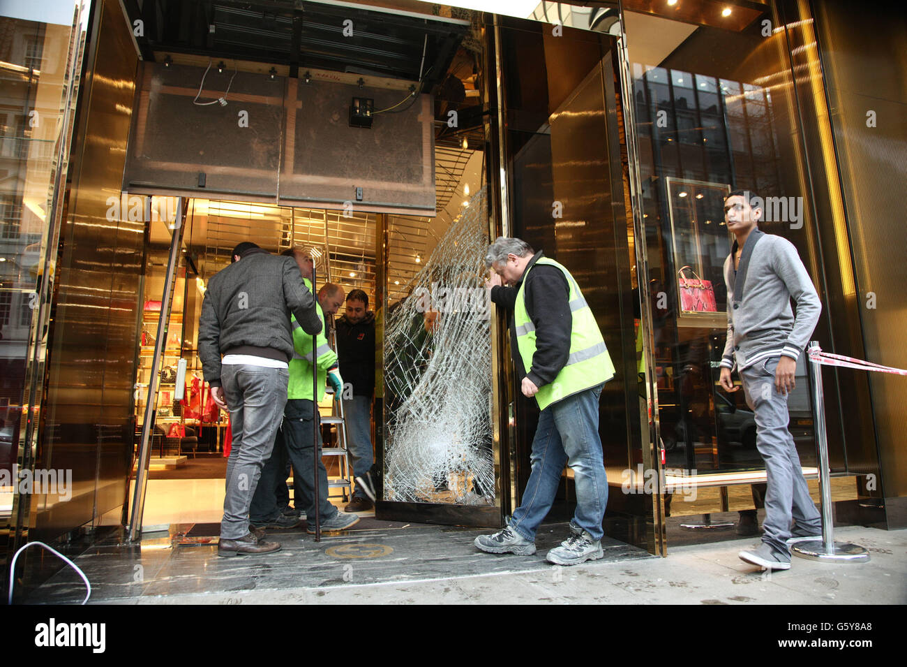 Gucci store ram-raided. The damaged entrance to the Gucci store on ...