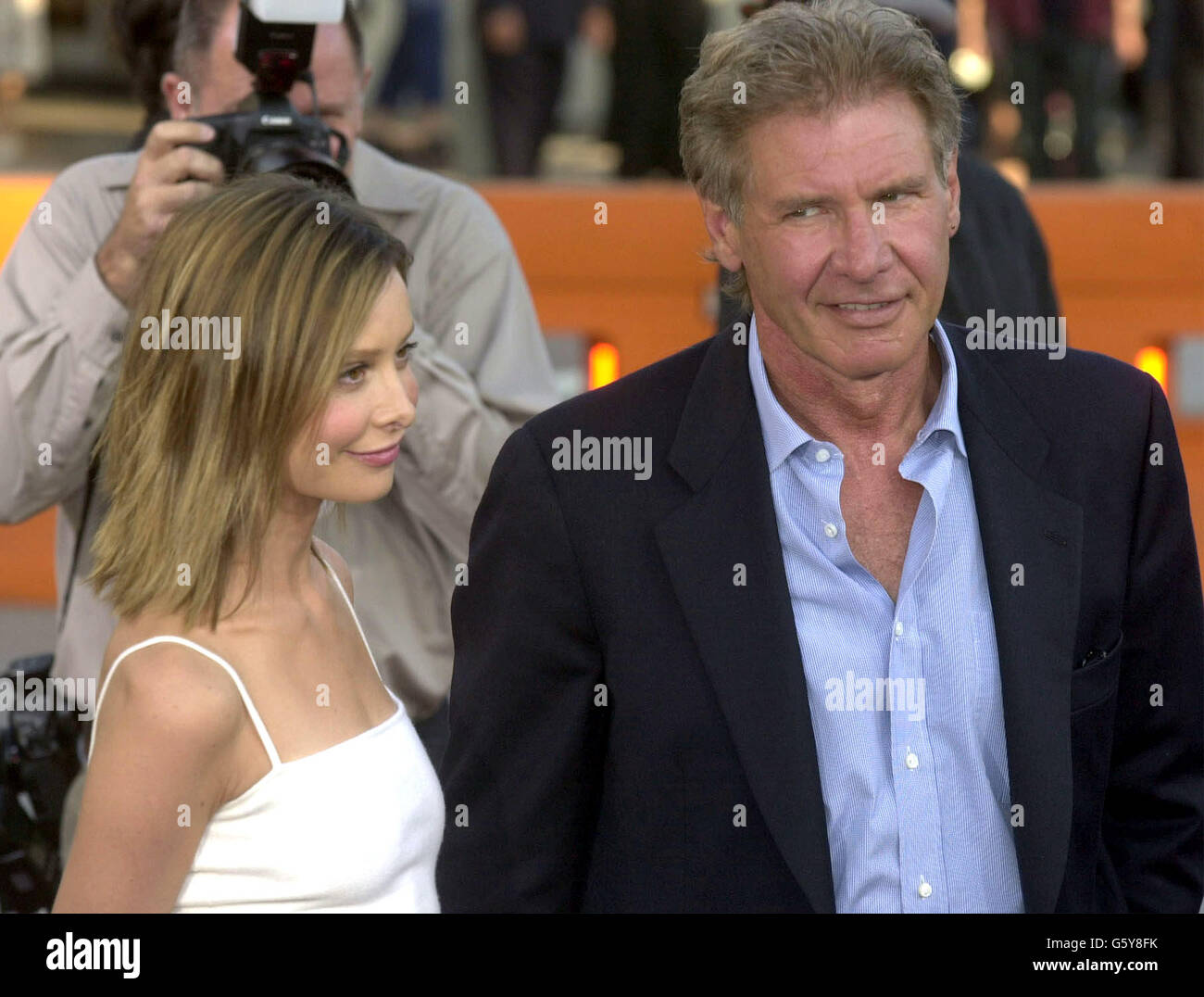 Harrison Ford and girlfriend Calista Flockhart arrive at the premiere ...