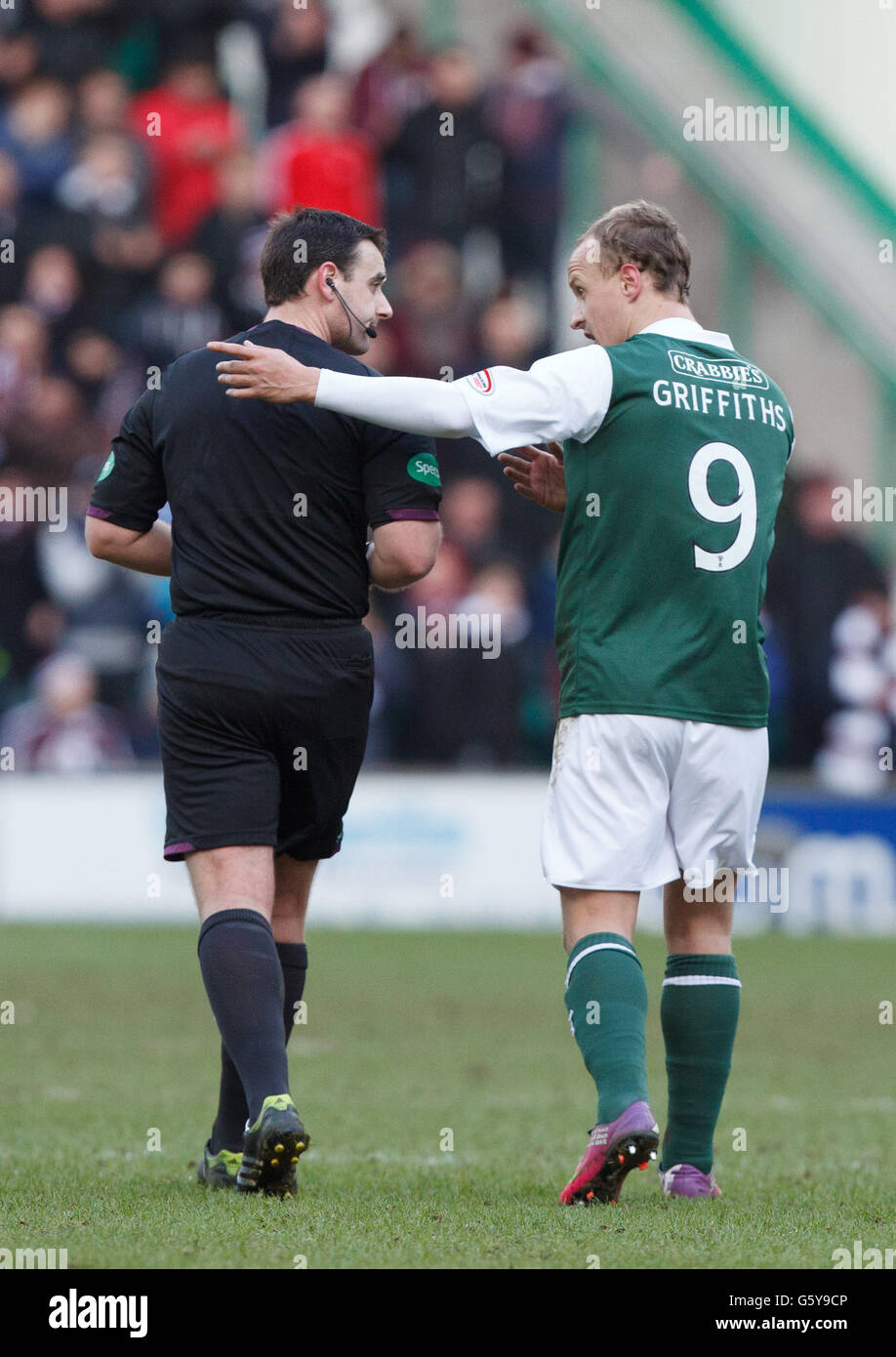 Hibernian's Leigh Griffiths talks with referee Euan Norris during the ...