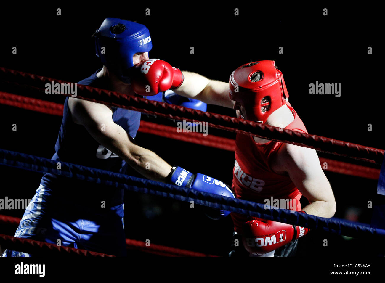 Amateur boxers fight during an Ultimate White Collar boxing competition ...