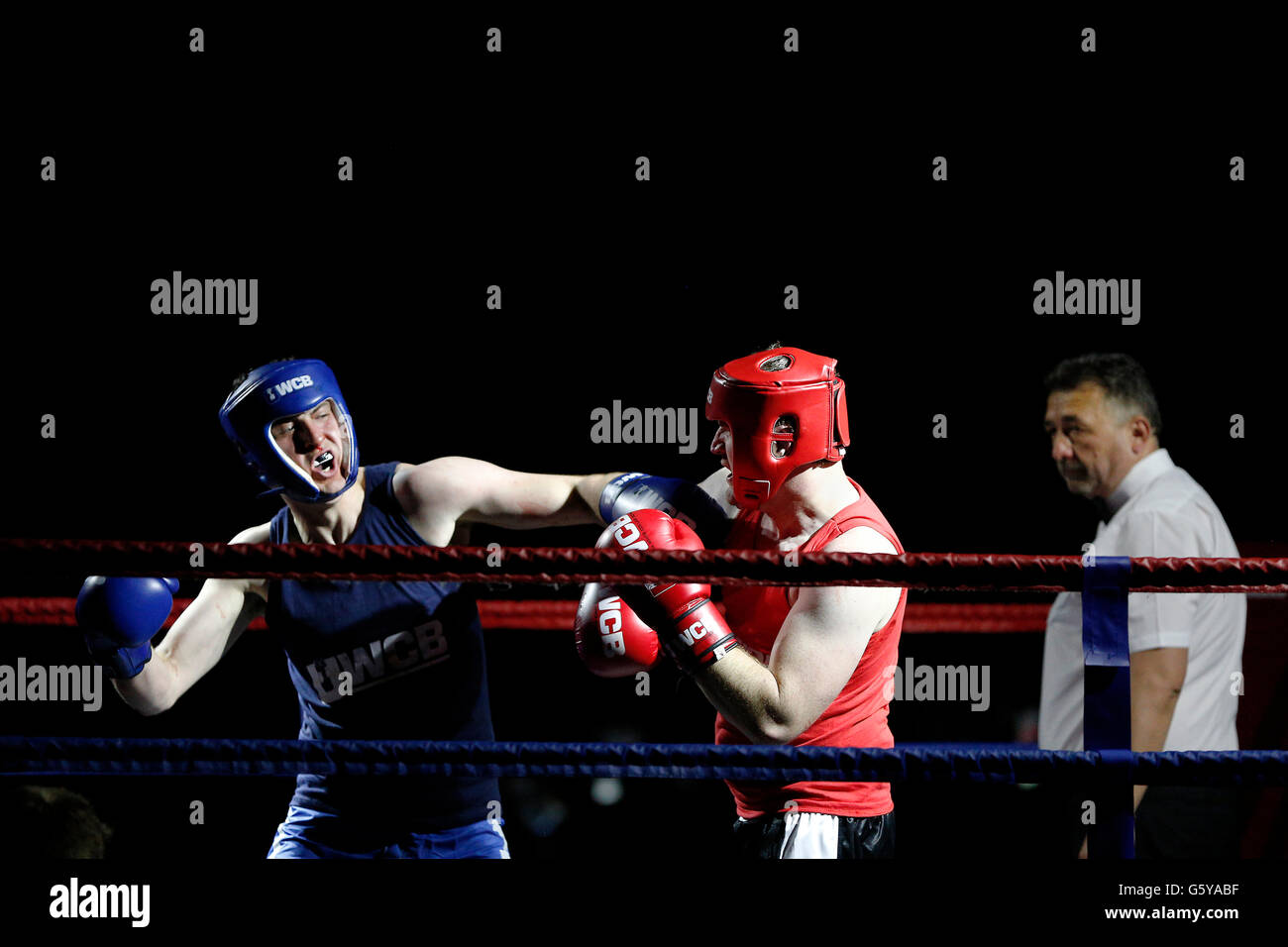 Amateur boxers fight during an Ultimate White Collar boxing competition ...