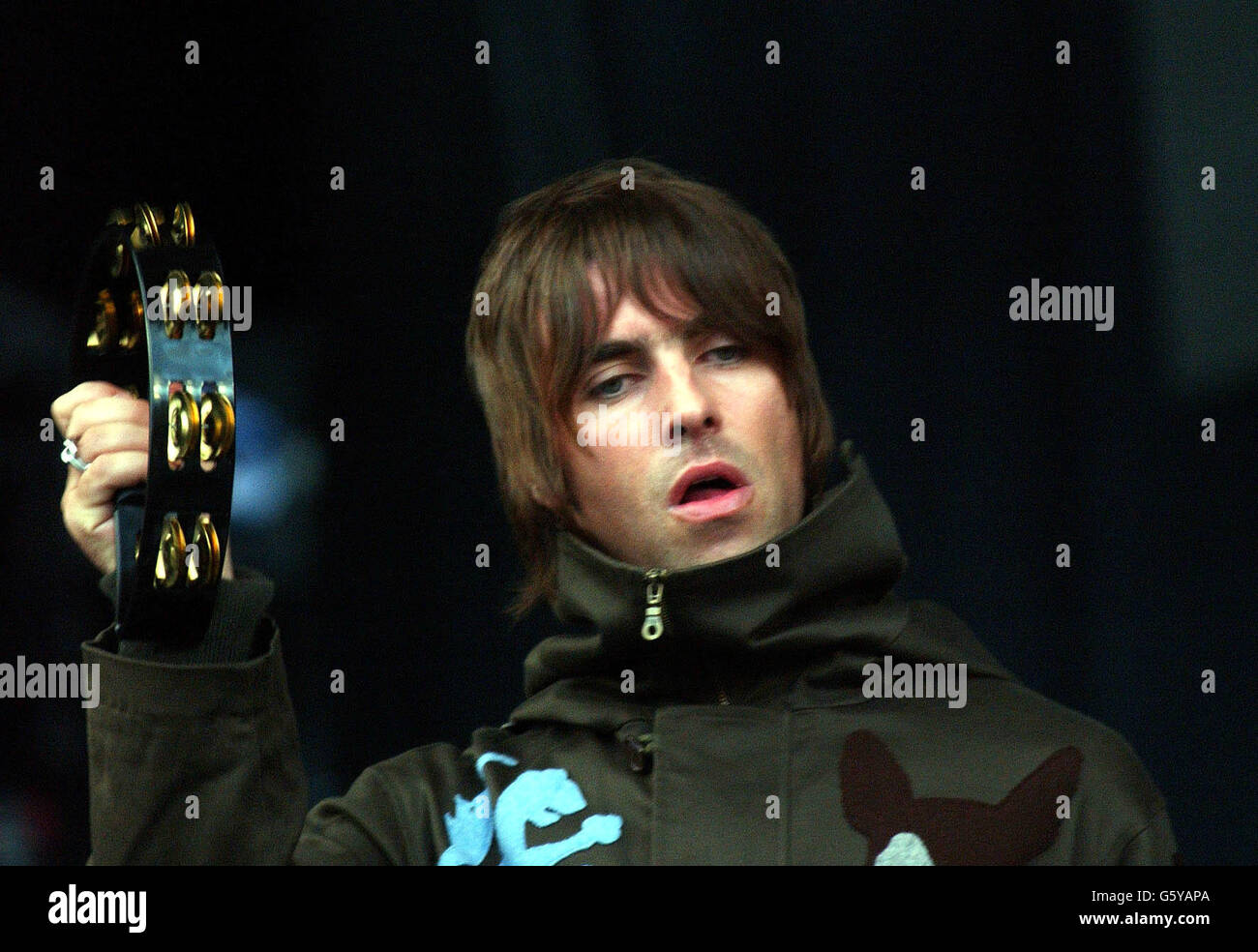 Celebrity pop star singer tambourine liam gallagher hi-res stock ...