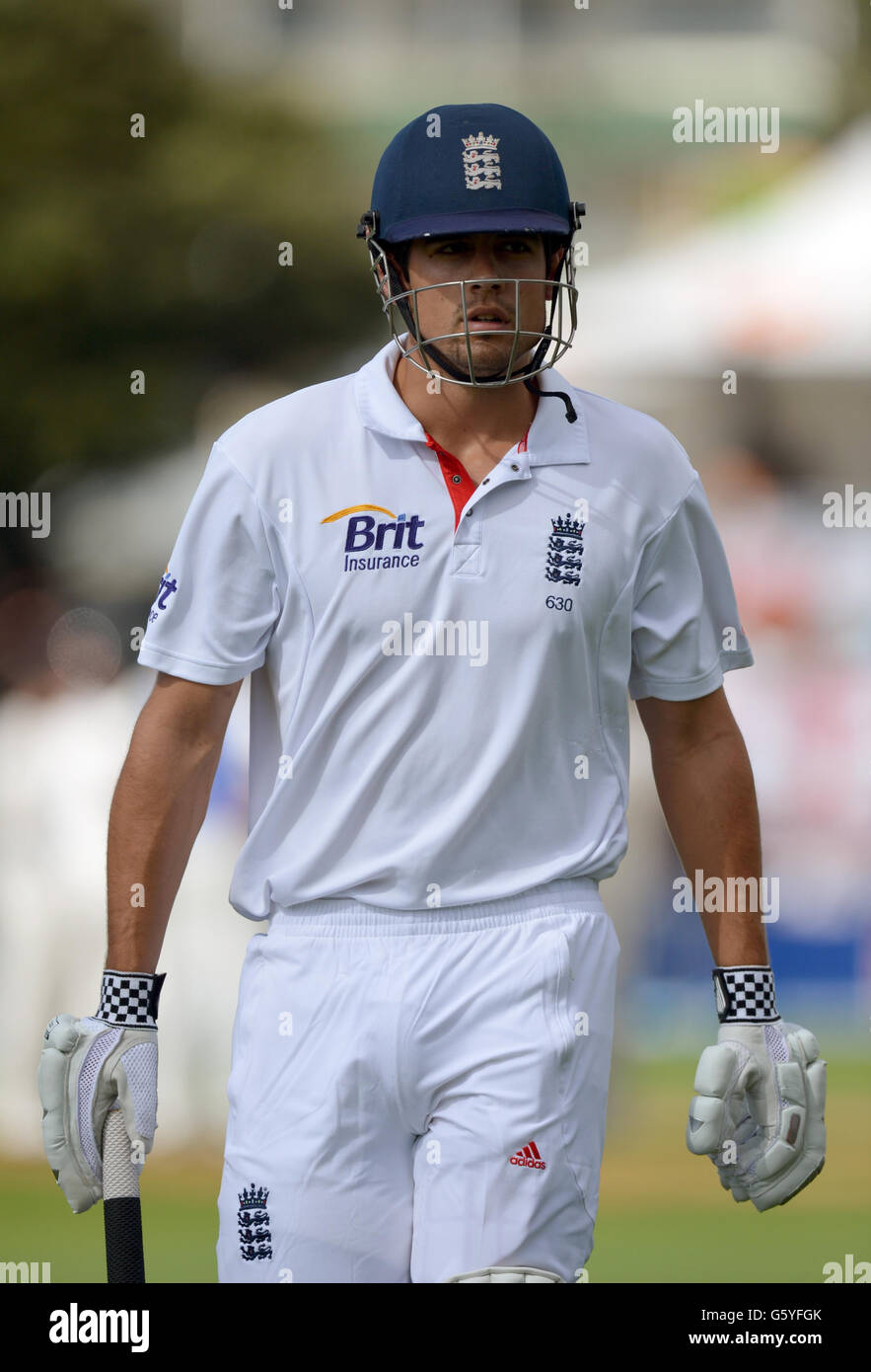 England's Alastair Cook leaves the field after losing his wicket during ...