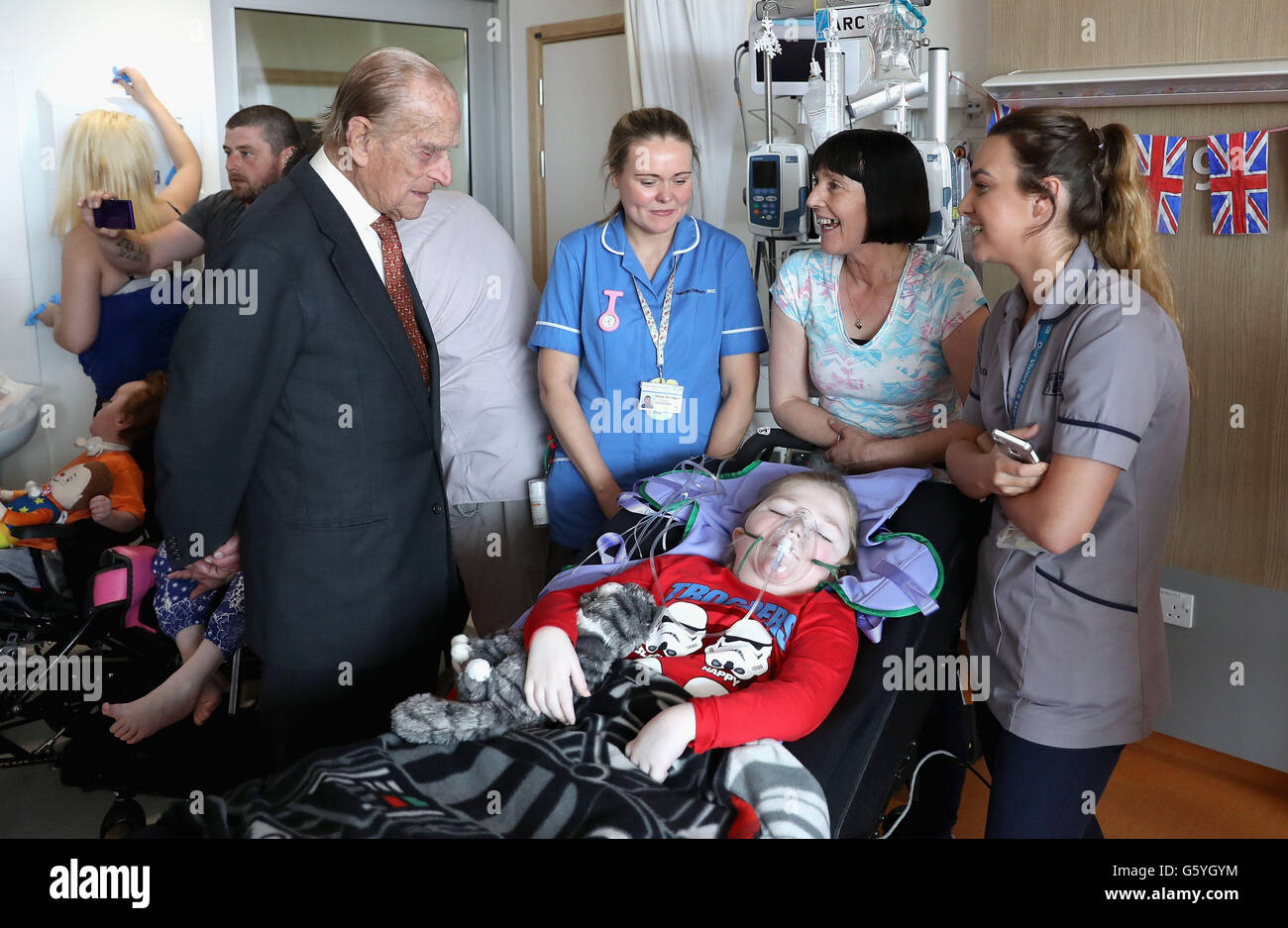 The Duke of Edinburgh talks to patients in ward 3C as he visits Alder ...