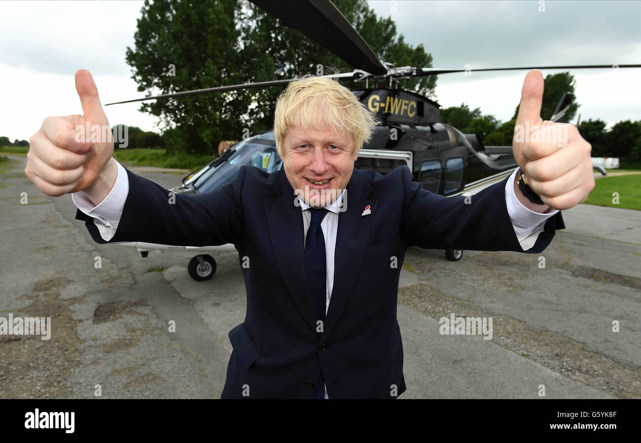 Boris Johnson prepares to board a helicopter in Selby, North Yorkshire ...