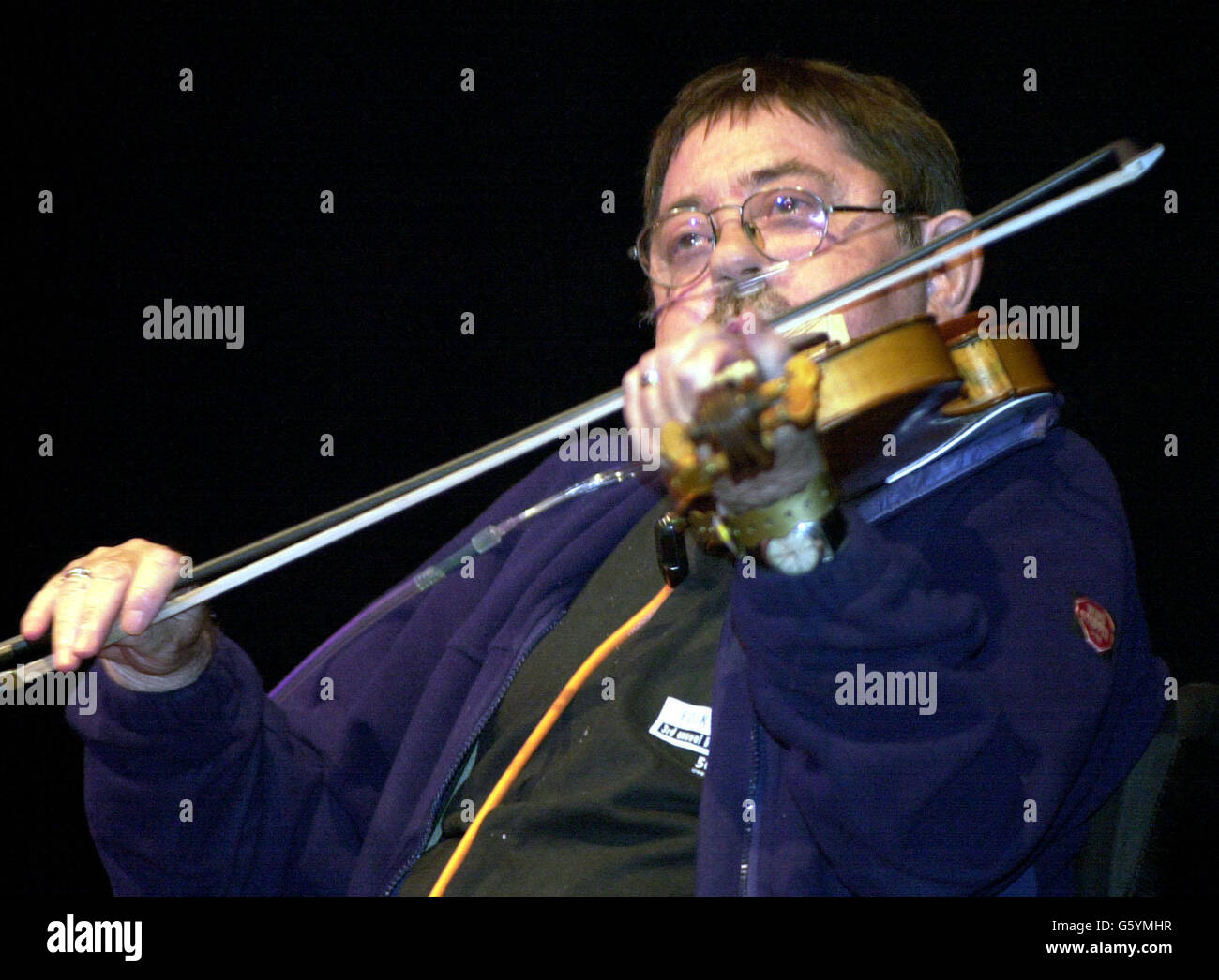 Fiddle player Dave Swarbrick performing (with the aid of oxygen) on ...