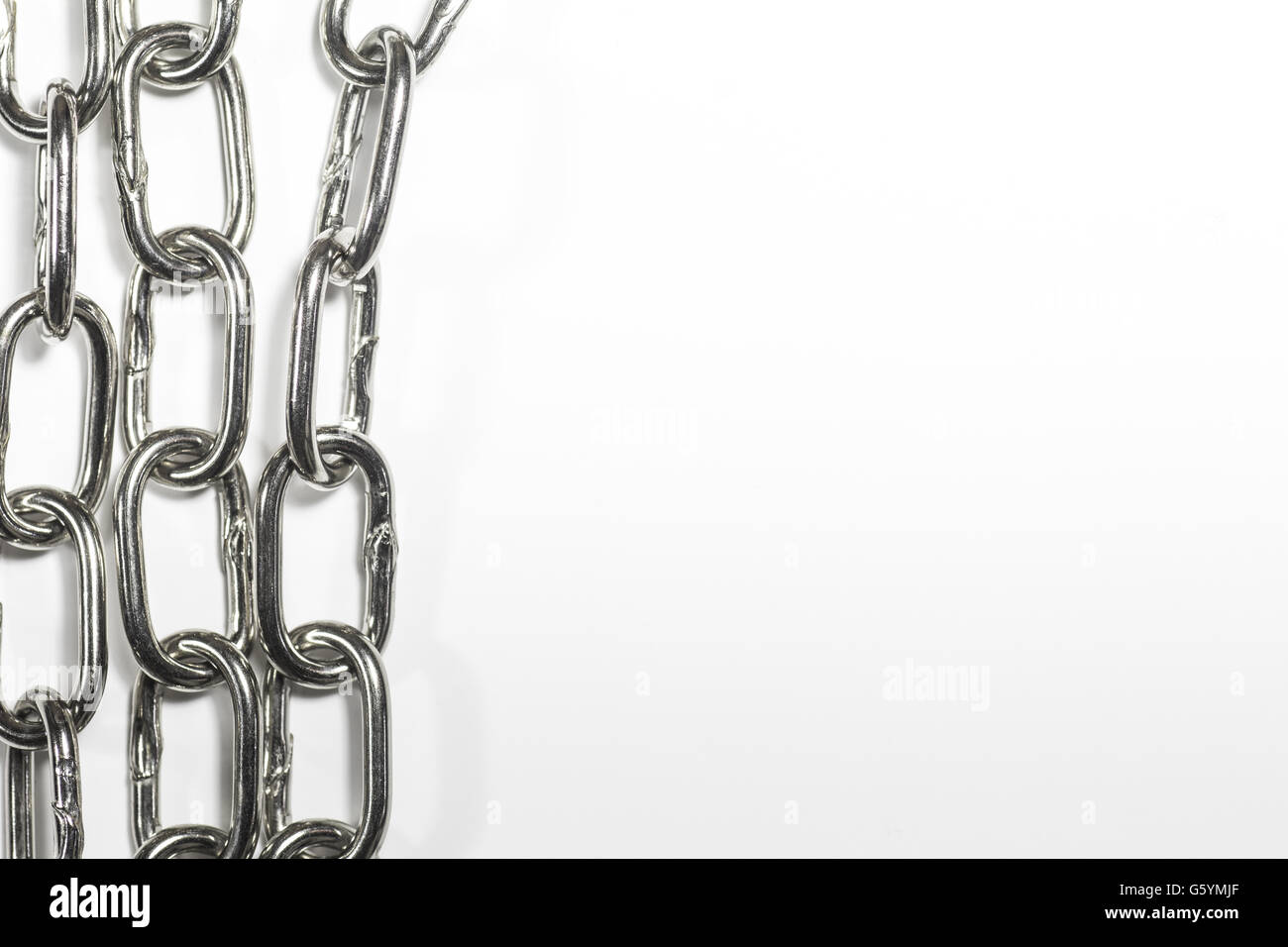 3 Pieces of chain on side of frame Stock Photo - Alamy