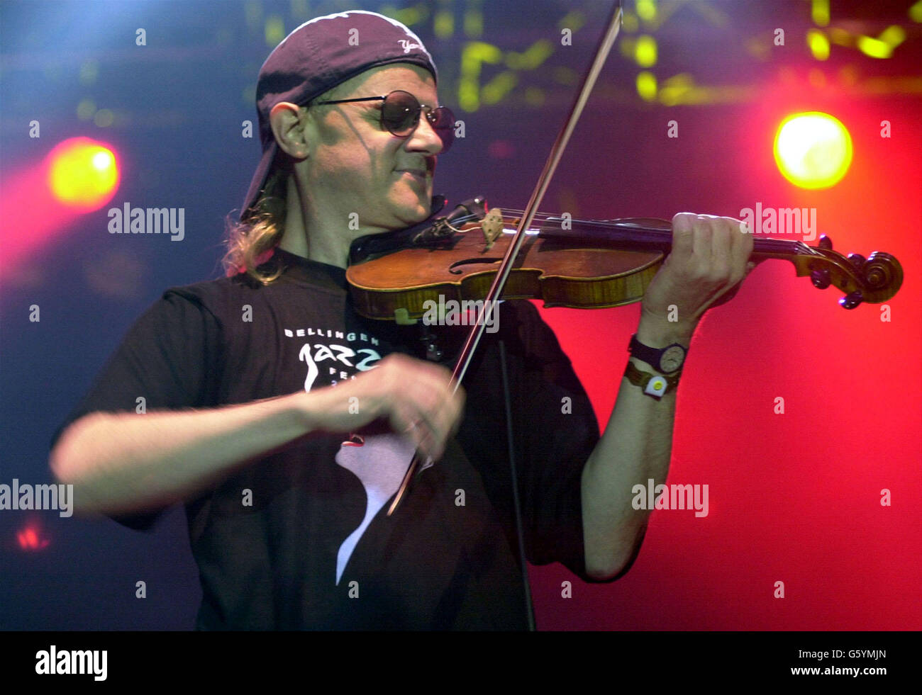 Fiddle player Rik Sanders performing on stage with Fairport Convention ...