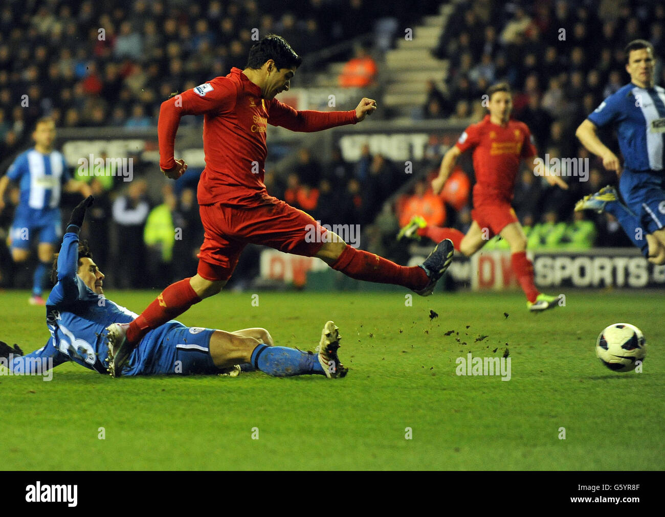 Liverpool's Luis Suarez scores his hat-trick and the fourth goal of the ...