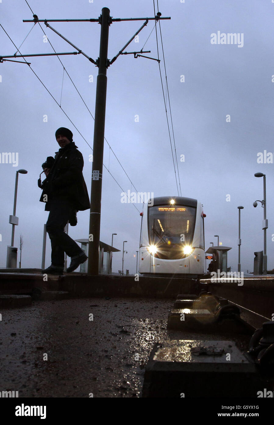 A tram takes a trip along the first section of the Edinburgh tram route ...