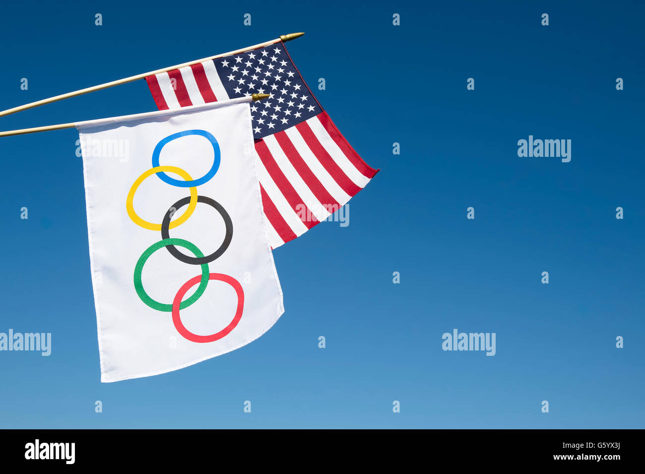 RIO DE JANEIRO - MARCH 27, 2016: Olympic and American flags hang in ...
