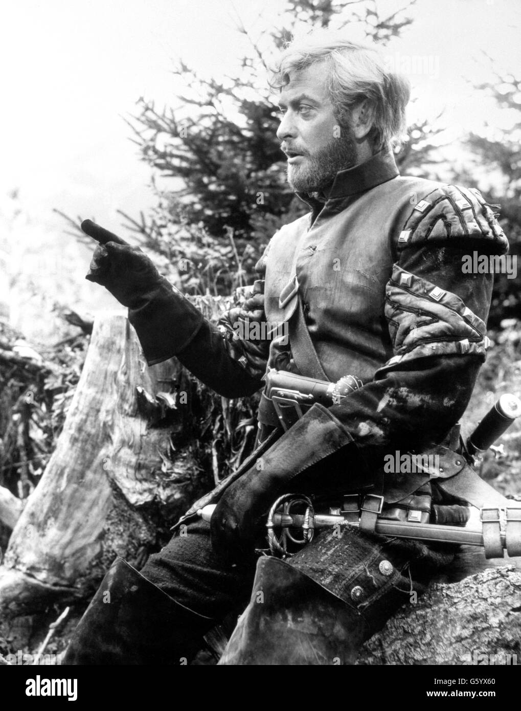 Michael Caine, on location in Austria, dressed as a captain of ...