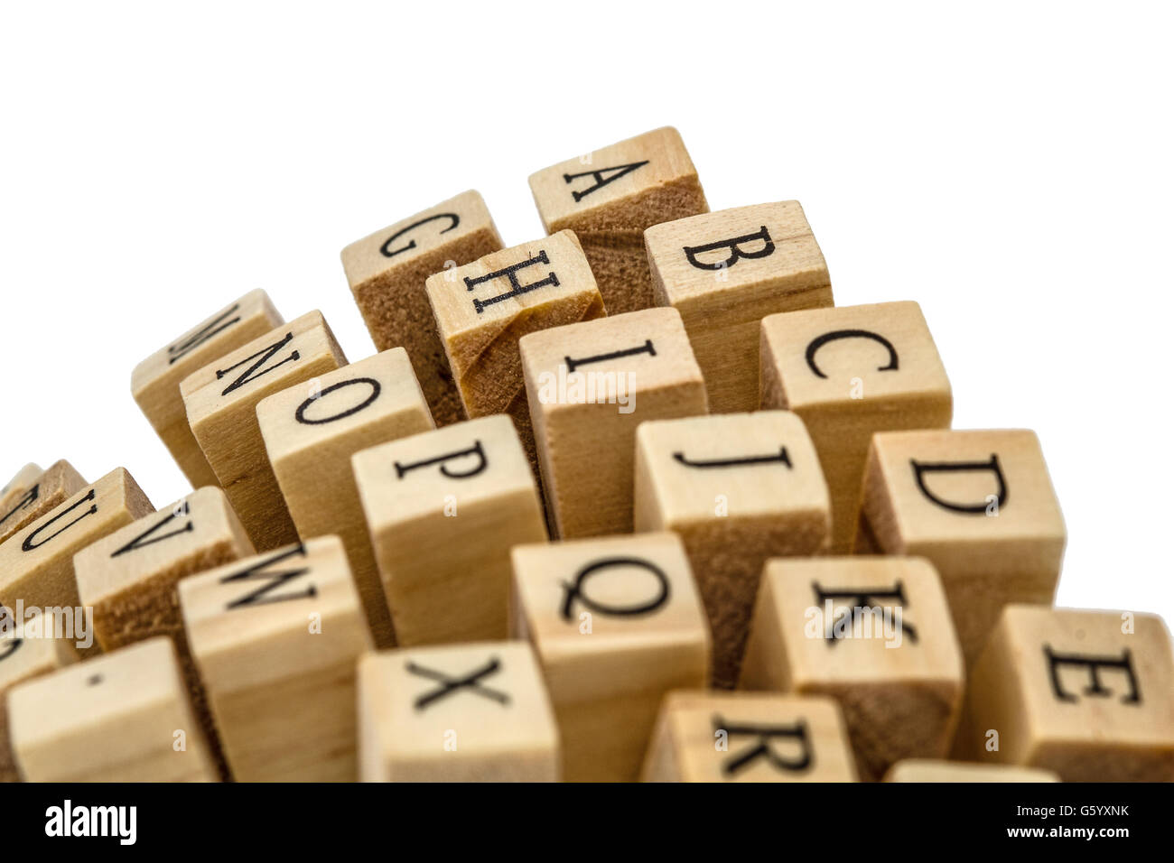 Letters of the English alphabet on the ends of wooden bars, isolated on ...