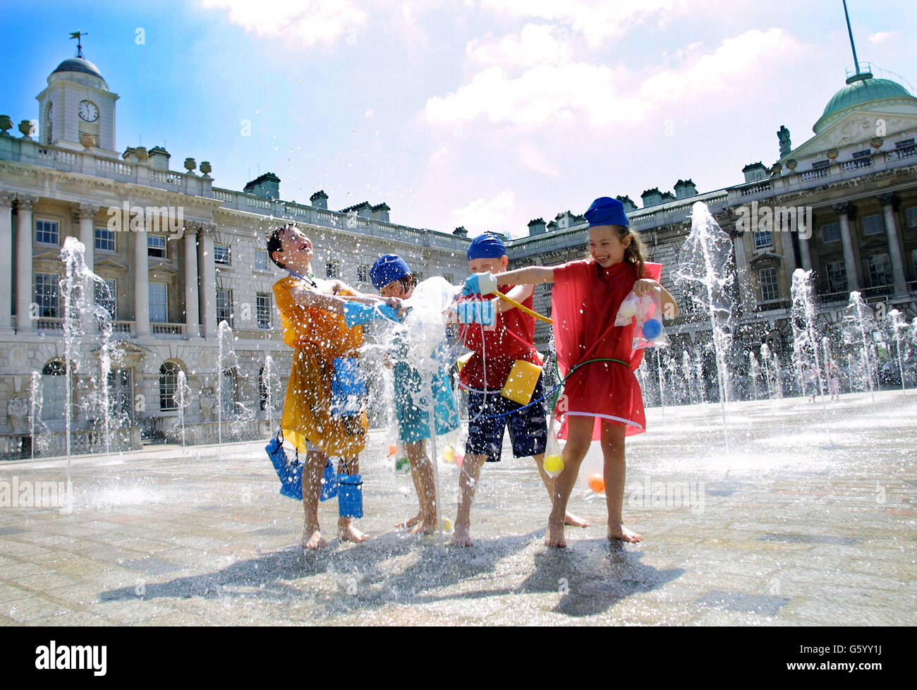 Children (left to right) Saul Sebag-Montefiore, 9, Clare Castlett, 7 ...