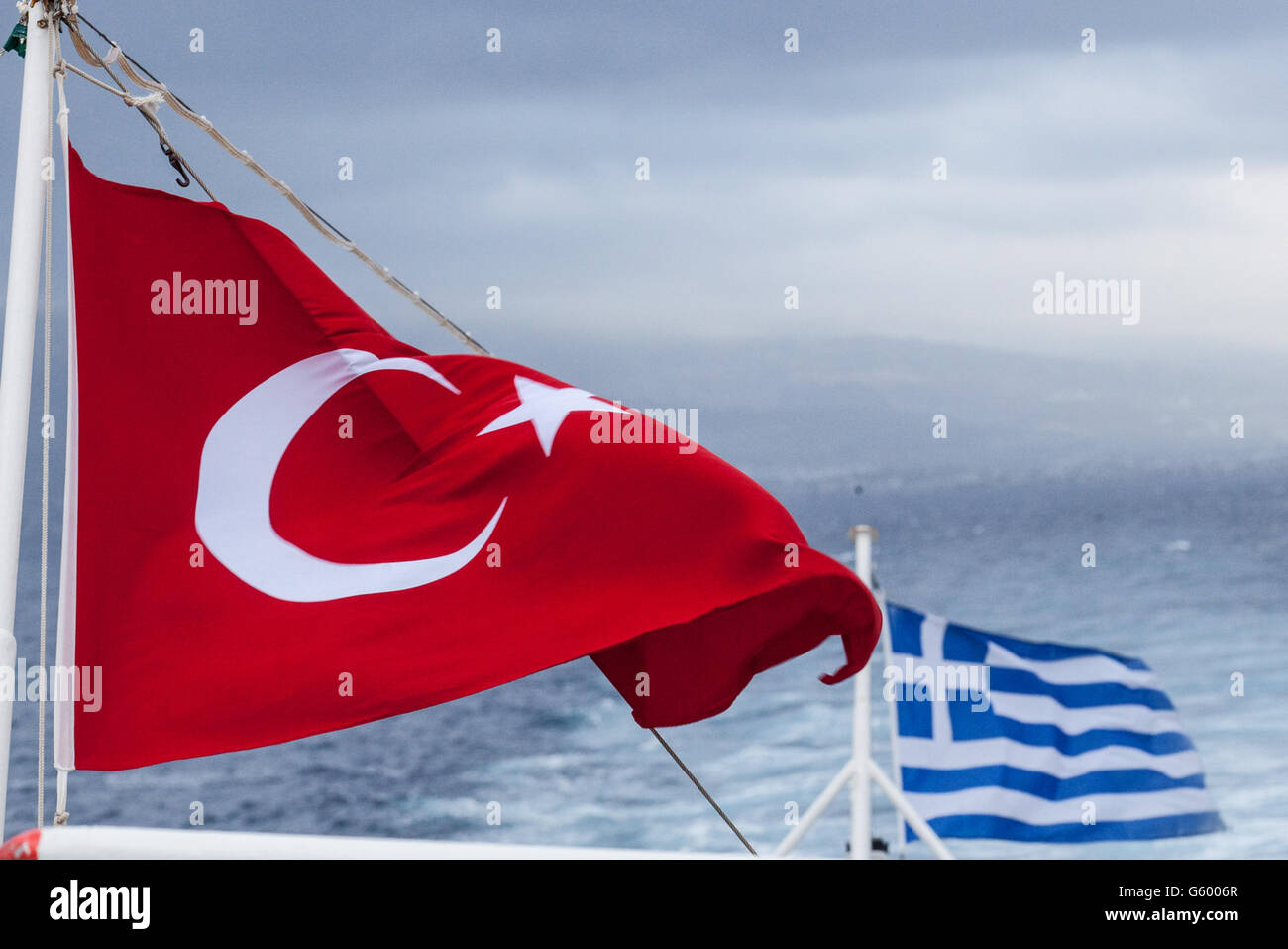 Turkish and Greek flags with the sea Stock Photo - Alamy