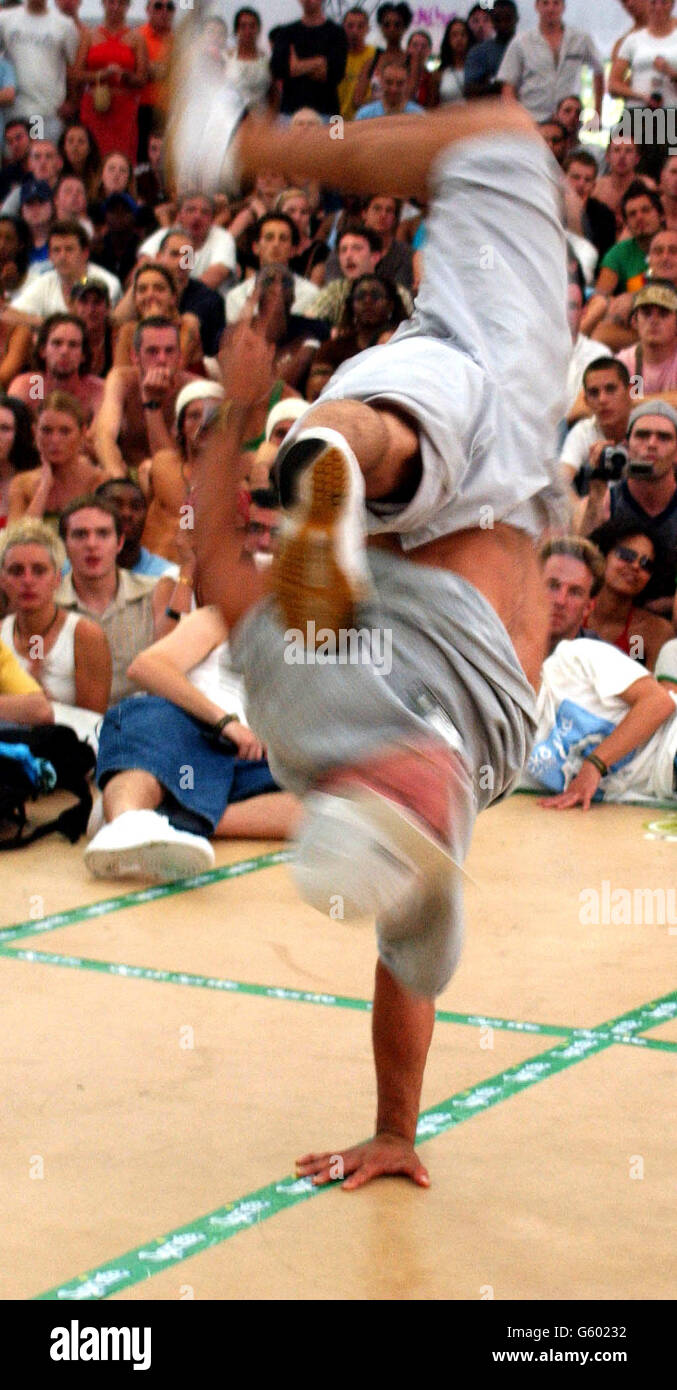 A break dancer performs at the Sprite Urban Games 2002, on Clapham ...