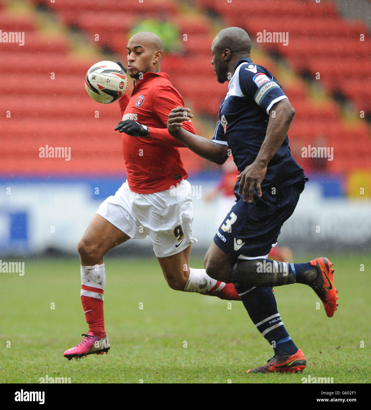 Charlton Athletic's Danny Haynes (left) and Millwall's Danny Shittu ...