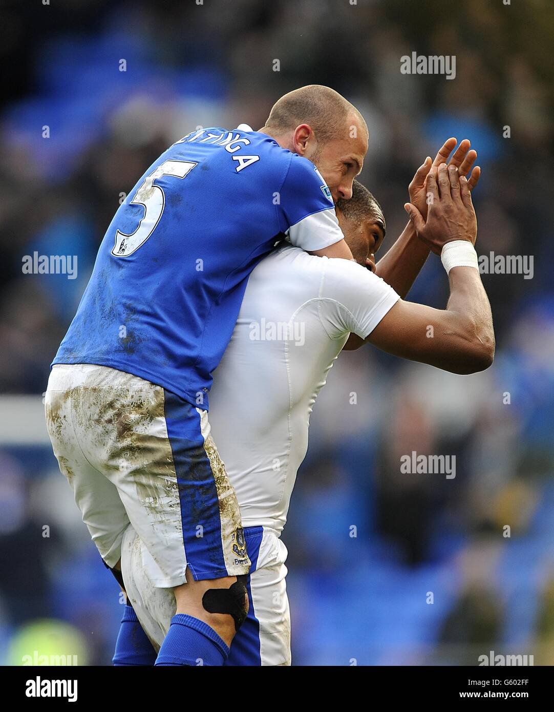 Everton's Johnny Heitinga celebrates victory after the final whistle ...