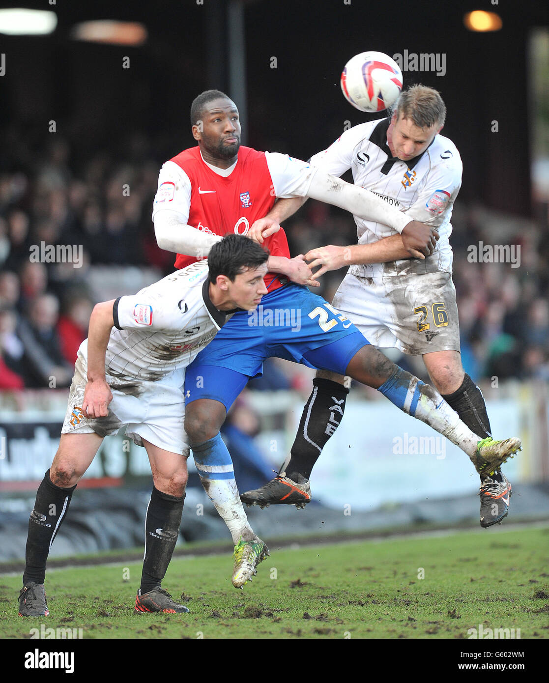 Port Vale's Louis Dodds (left) and Chris Birchall (right) battles with ...