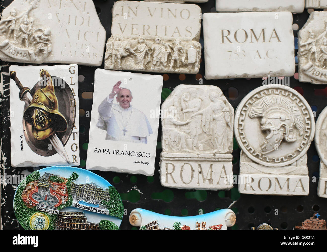 Merchandise for sale on stalls as Pope Francis delivers his Angelus ...