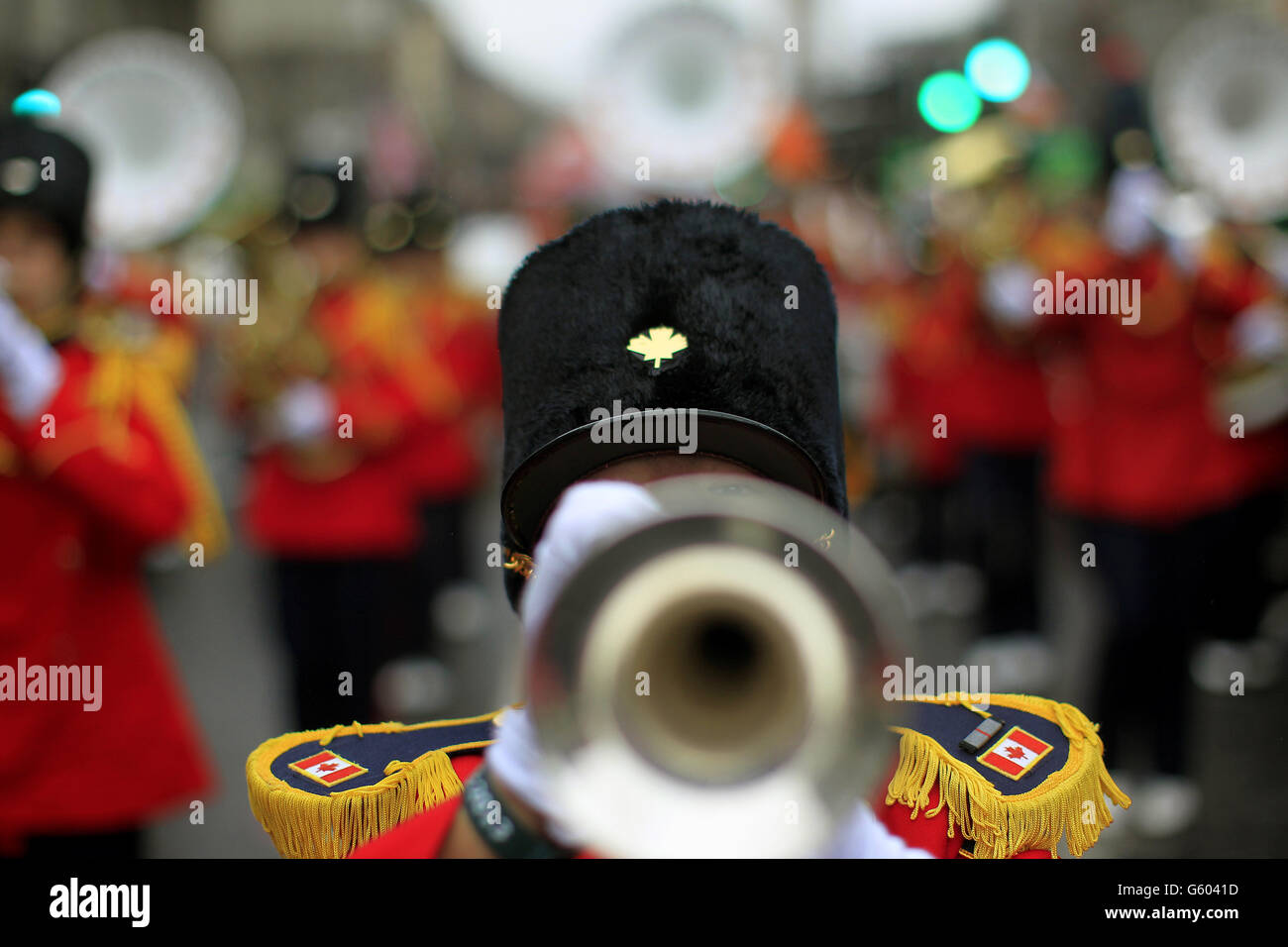 A Canadian marching band joins revellers during the St Patrick's day ...