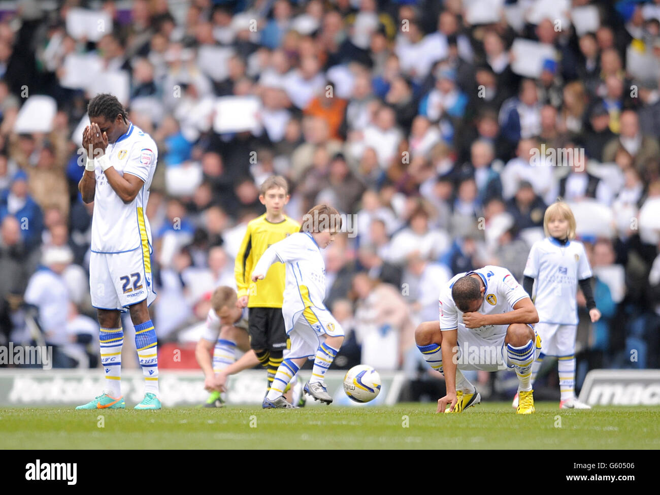 A mascot plays with a football on the pitch before kick-off as Leeds ...
