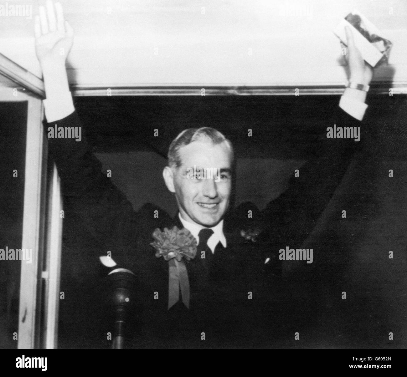 Schoolmaster Fergus Montgomery lifts his arms in triumph after winning ...