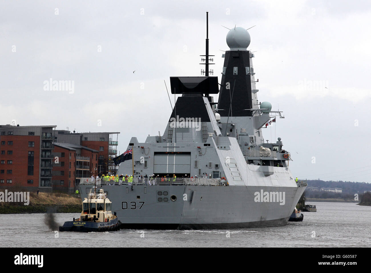 Staff at BAE System wave as Duncan, the Type 45 Destroyer, leaves BAE ...