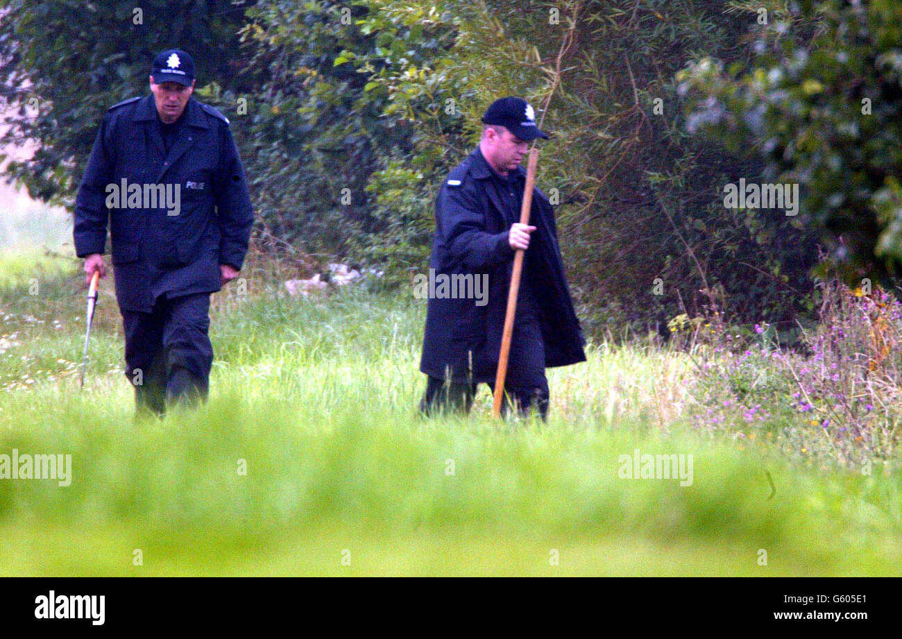 Missing girls farm search Stock Photo - Alamy