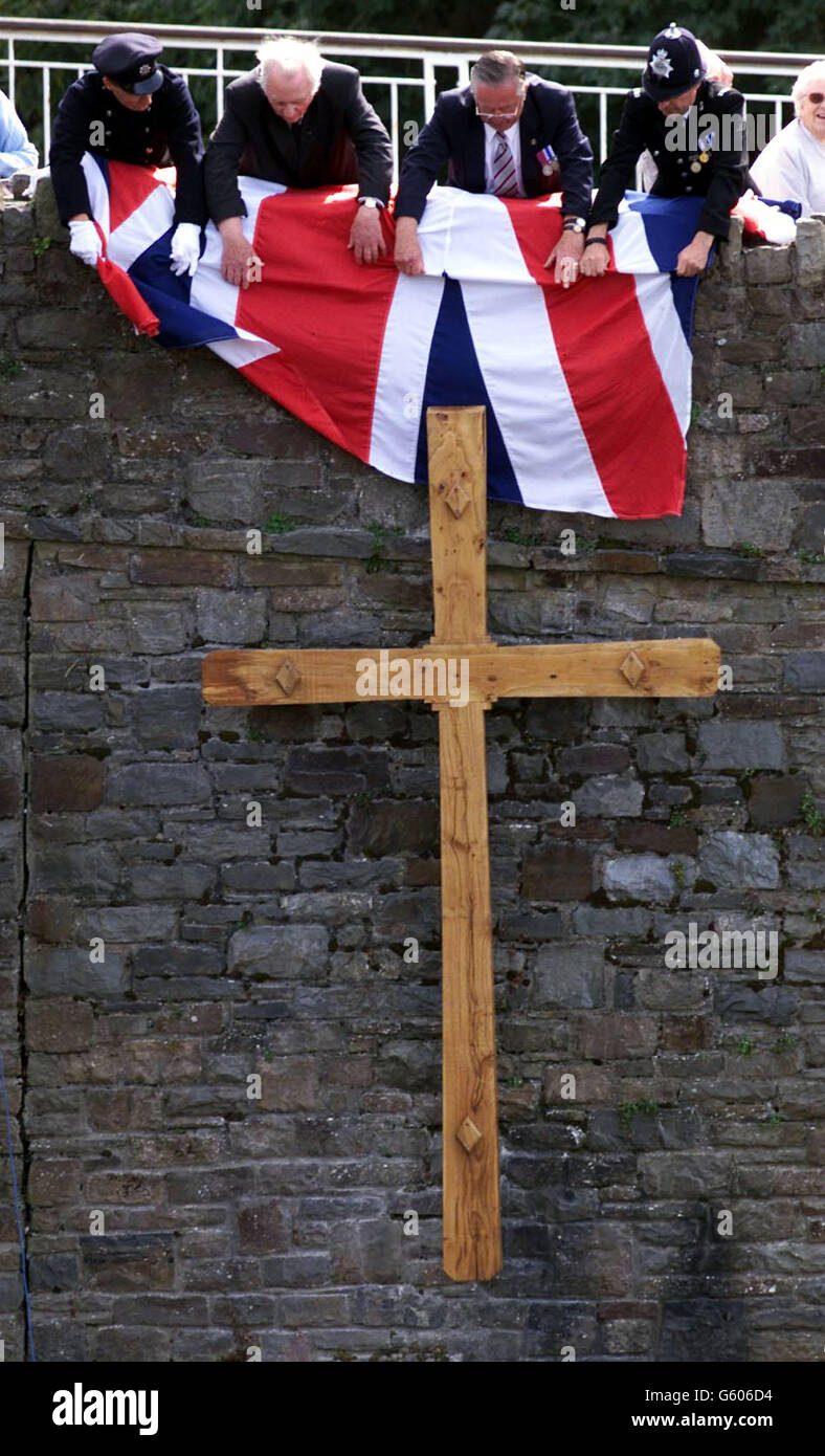 Police and Fire officers from Lynton and Lynmouth unveil a cross on the ...