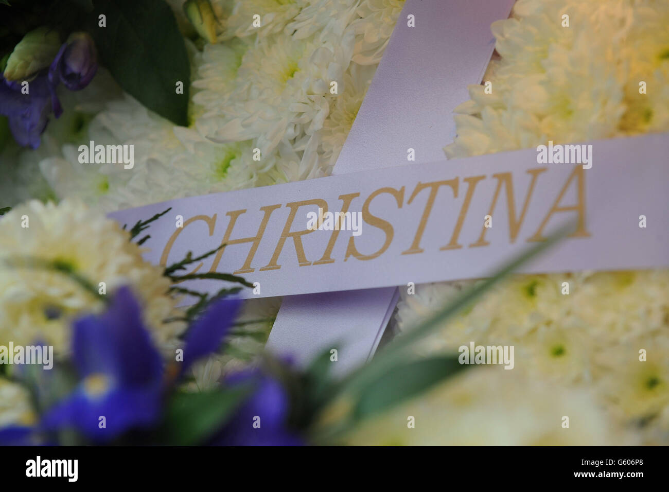 Floral tributes for Christina Edkins seen in the hearse carrying her ...