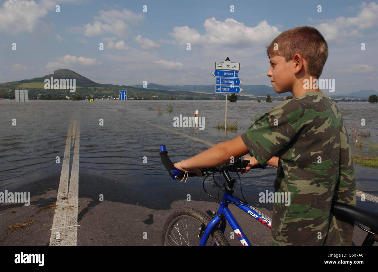 David Hanus looking over his village after big flood hit his small town ...
