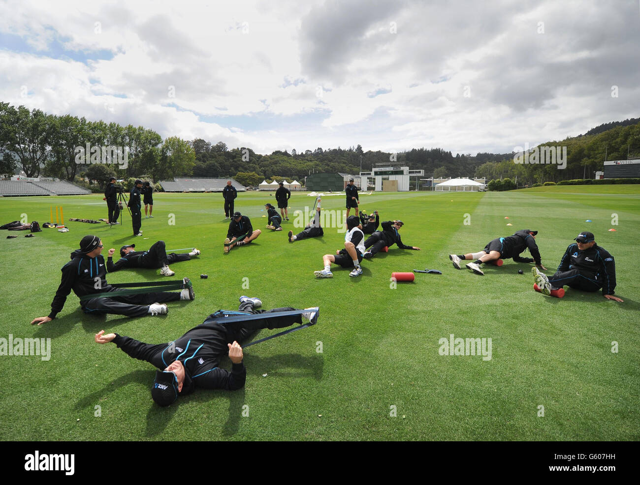 New Zealand players stretch during a nets session at the University ...