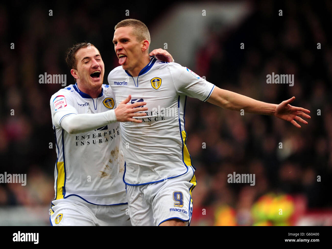 Leeds United's Steve Morison celebrates his goal with Tom Lees (left ...
