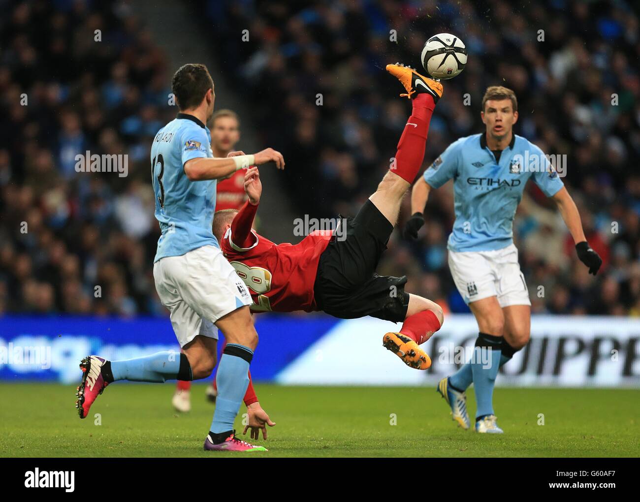 Barnsley's Ryan Tunnicliffe attempts a overhead kick attempt on goal ...