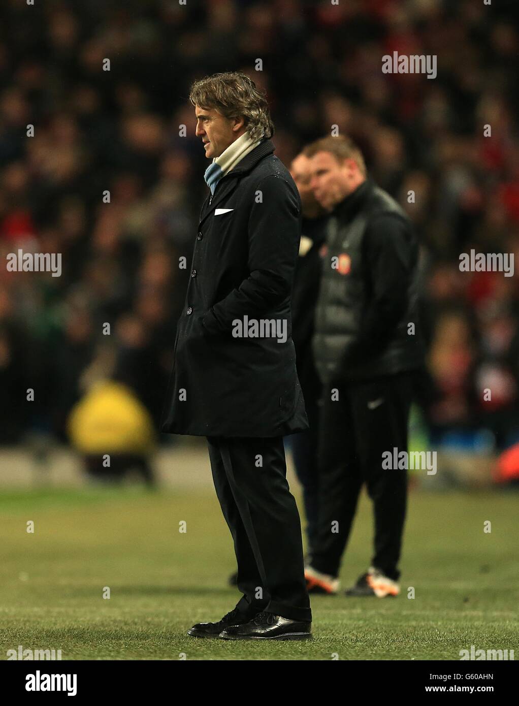 Manchester City manager Roberto Mancini and Barnsley manager David ...